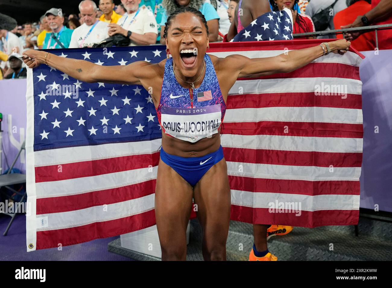 Gold medalist, Tara Davis-Woodhall, of the United States, celebrates ...