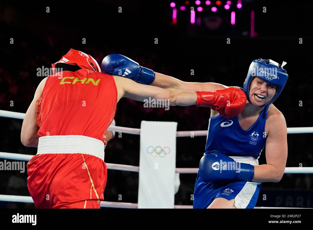 China's Li Qian, left, fights Australia's Caitlin Parker in their women ...