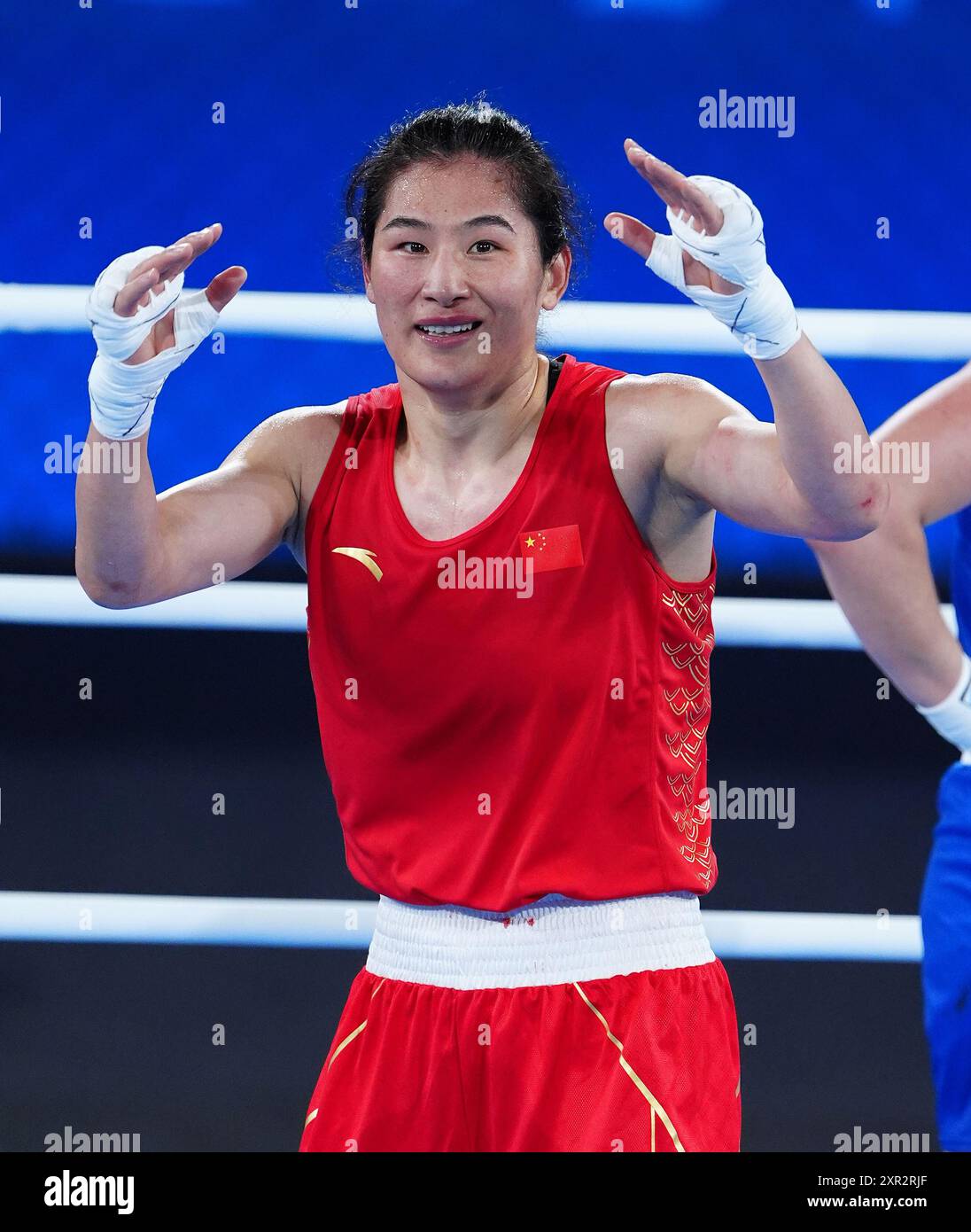 China’s Qian Li celebrates her victory over Australia’s Caitlin Parker ...