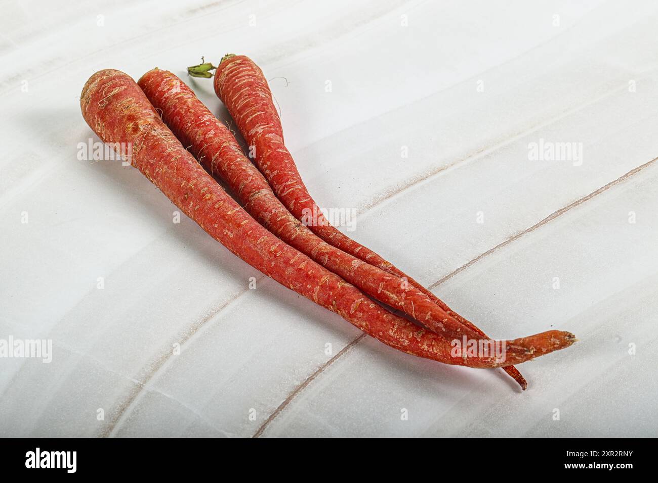 Raw ripe Indian red carrot root Stock Photo - Alamy