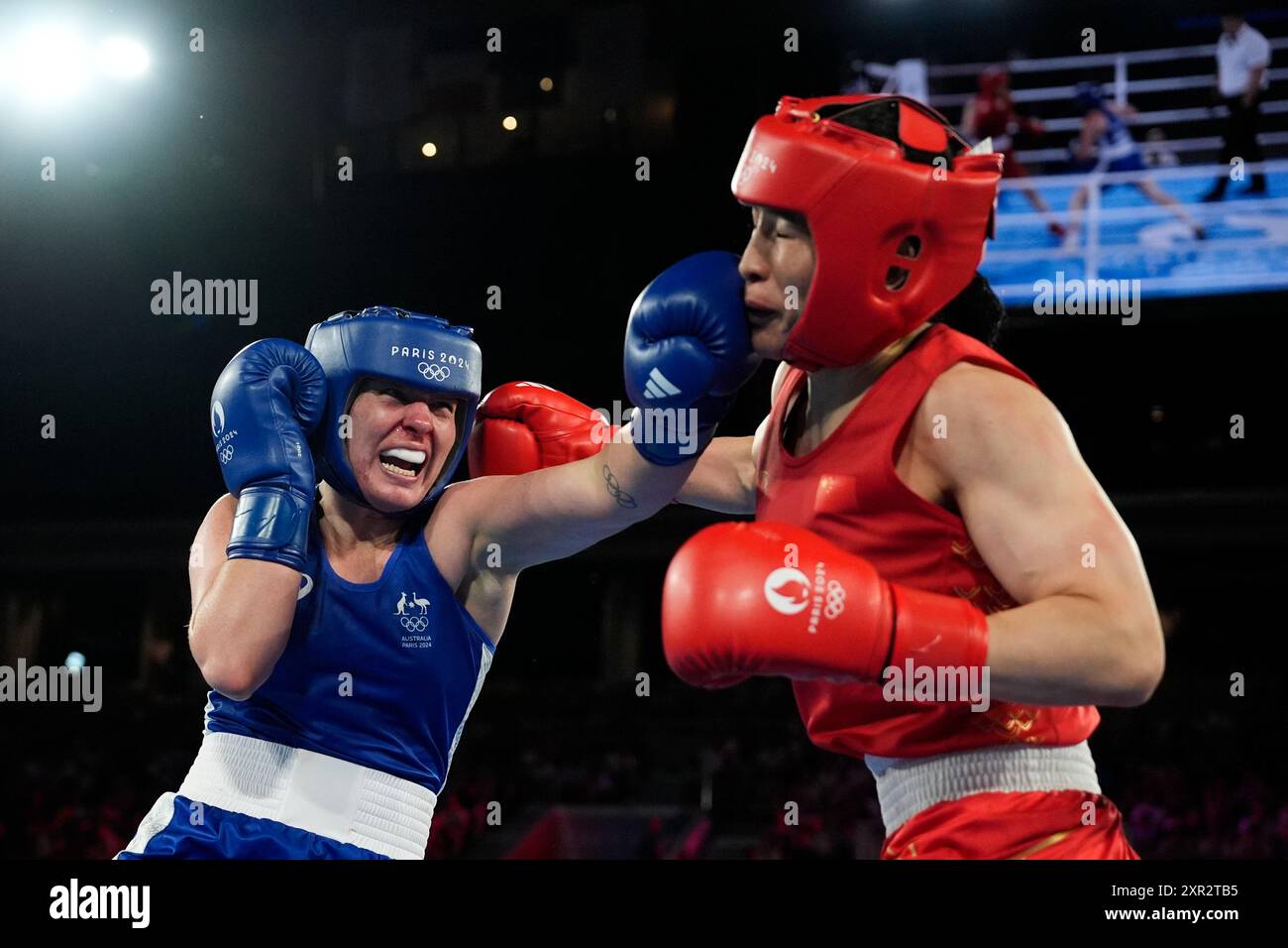 China's Li Qian, right, fights Australia's Caitlin Parker in their ...