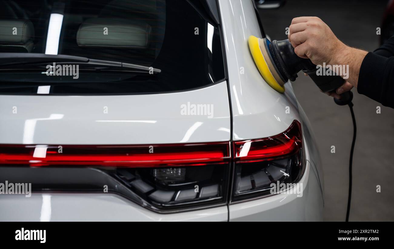 Process of polishing white car body surface using orbital polishing ...