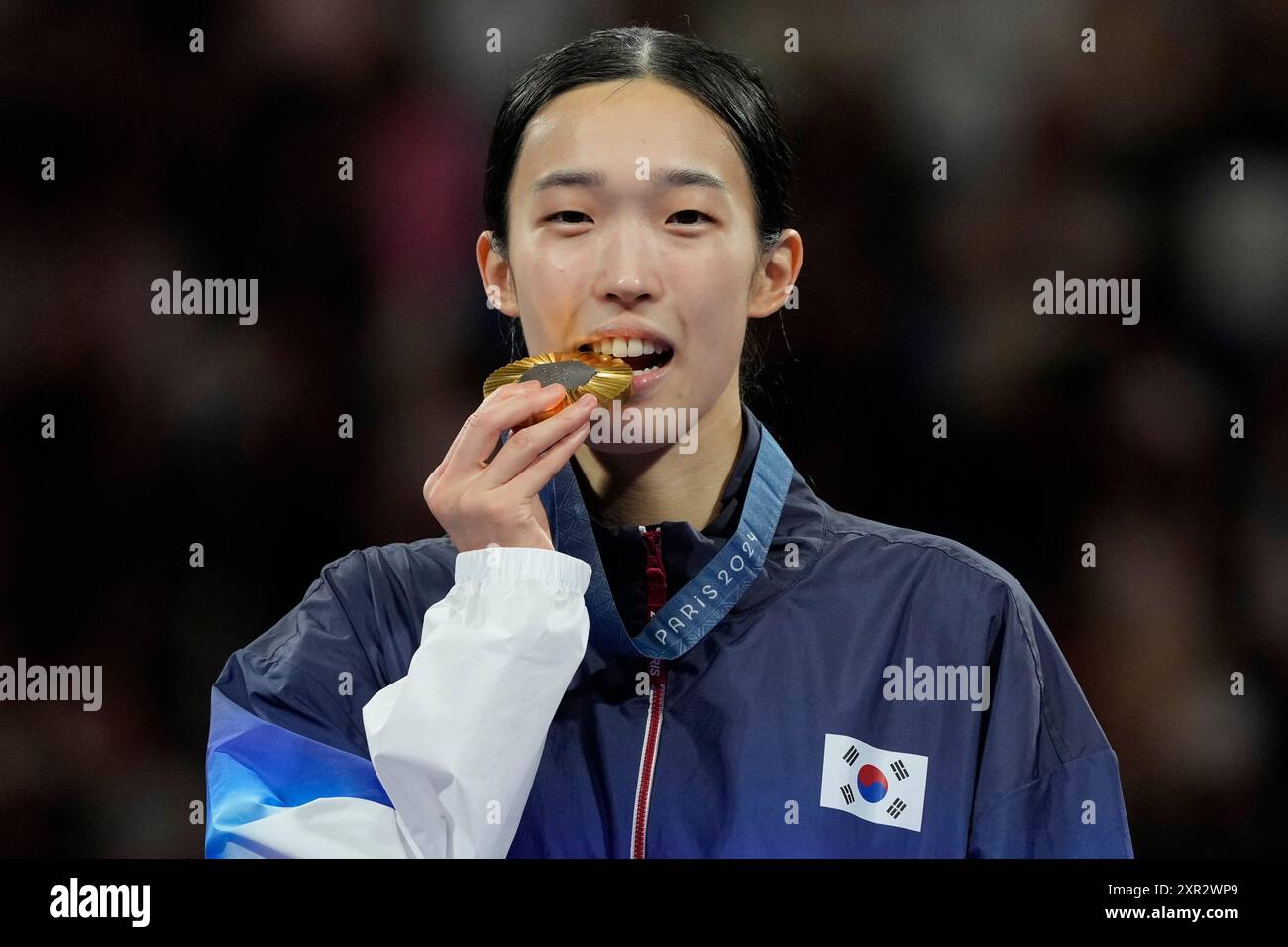 Korea's Kim Yujin celebrates on the podium after winning the gold medal ...