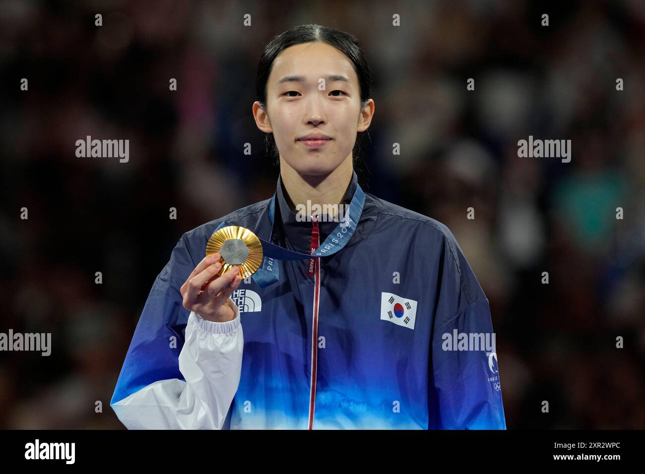 Korea's Kim Yujin celebrates on the podium after winning the gold medal ...