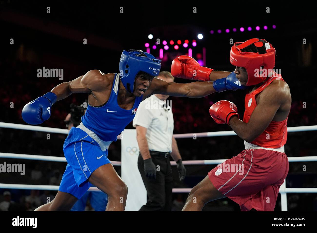 Refugee Olympic Team's Cindy Ngamba, right, fights Panama's Atheyna ...