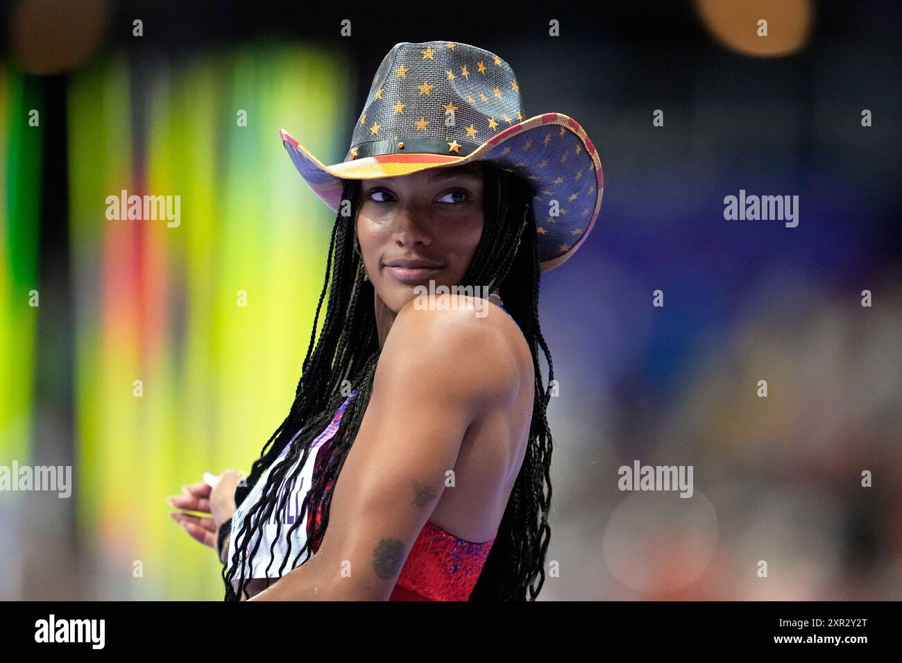 Tara Davis-Woodhall, of the United States, poses after winning the gold ...
