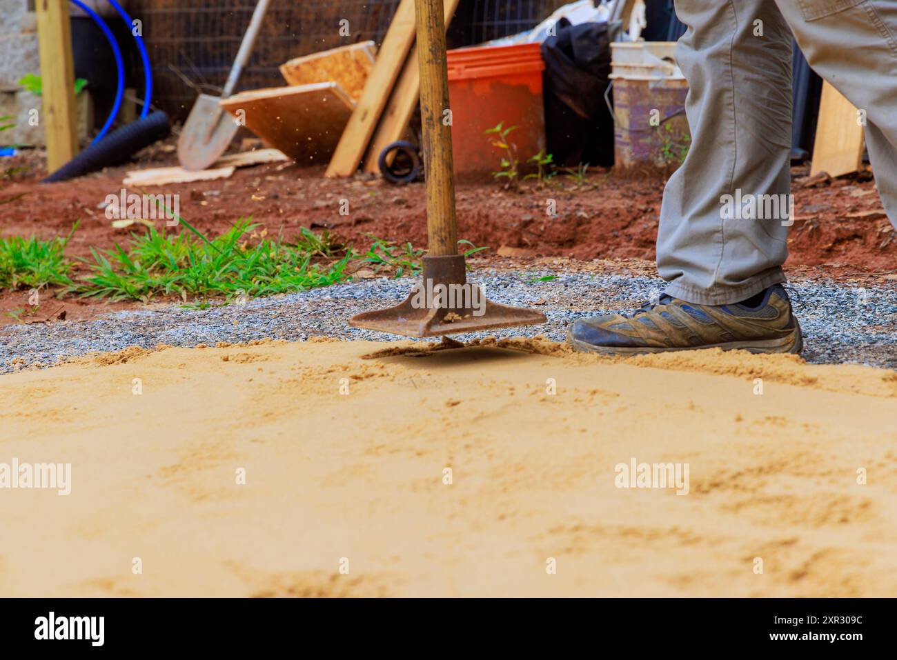 Worker compacting soil using hi-res stock photography and images - Alamy
