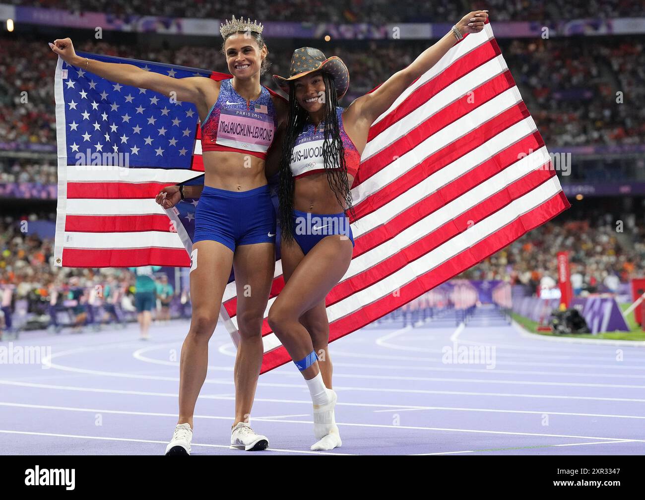Paris, France. 8th Aug, 2024. Long jump champion Tara Davis-Woodhall (R ...