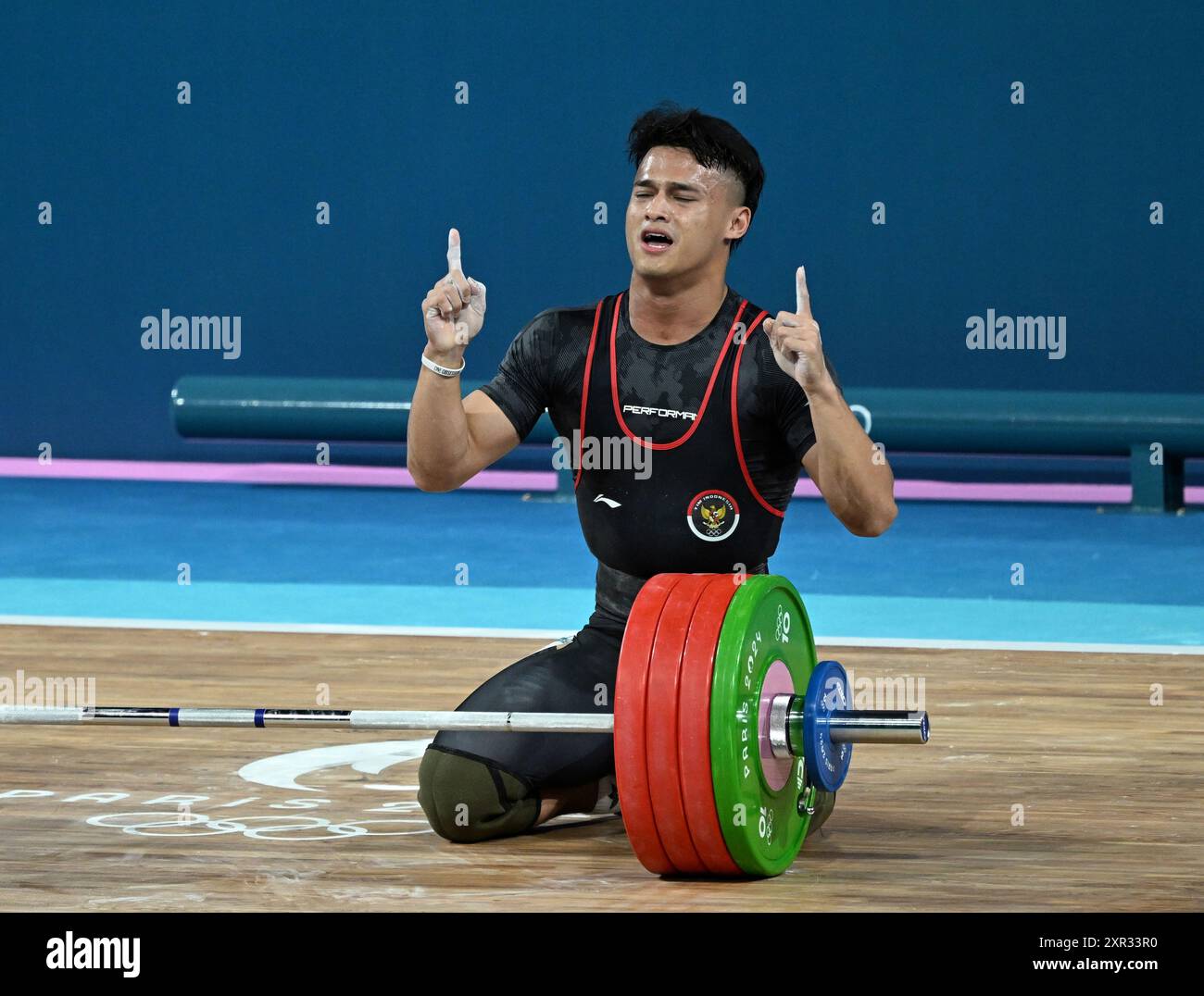 JUNIANSYAH Rizki of Indonesia reacts after winning the men's ...
