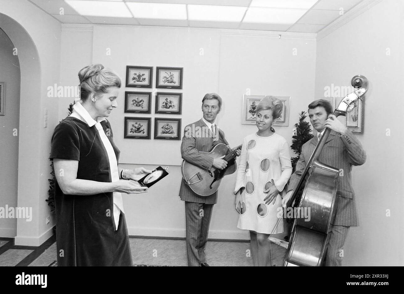 Needle artist Cecile Dreesmann honored. Also present is the musical ...