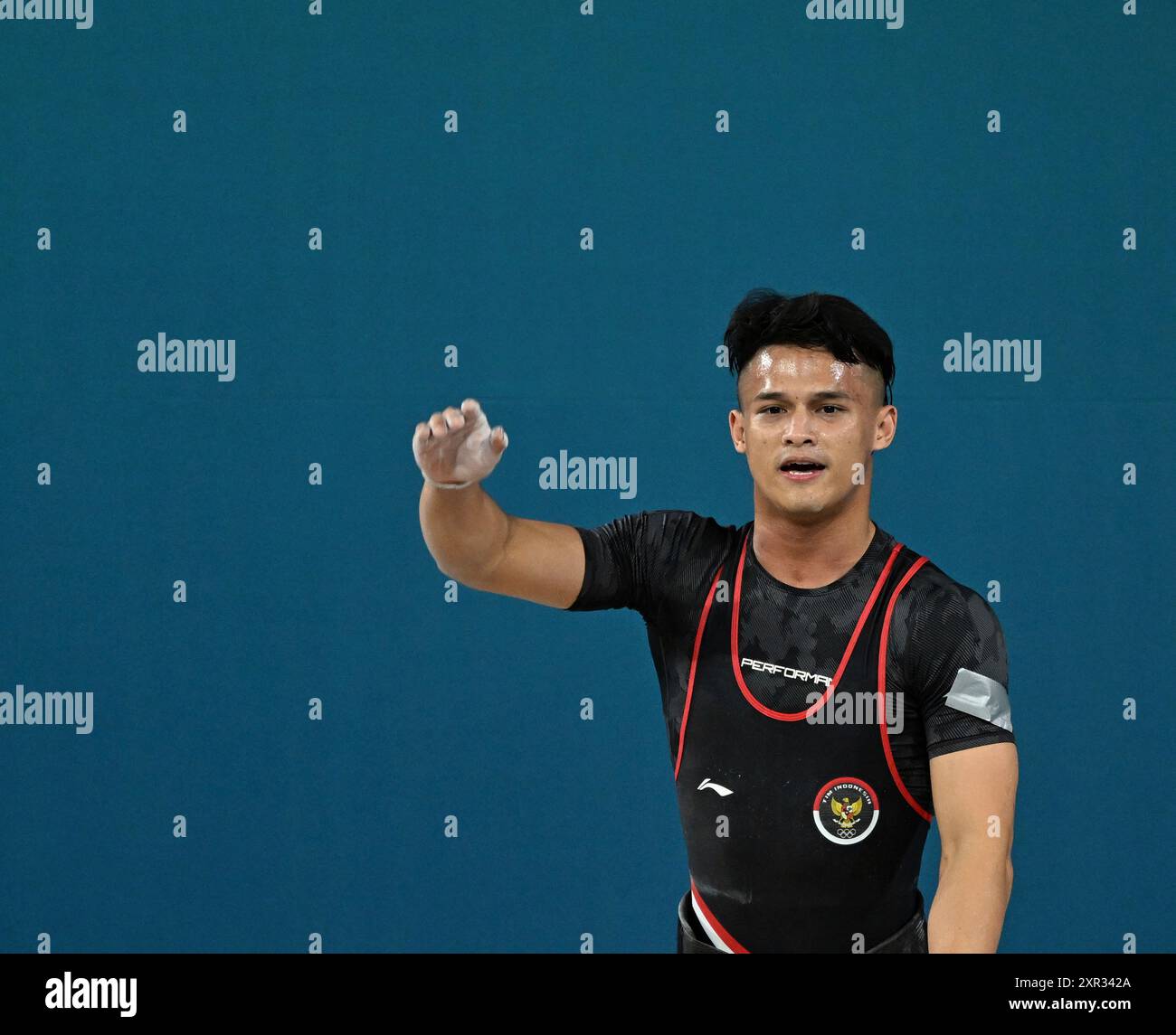 JUNIANSYAH Rizki of Indonesia reacts after winning the men's ...