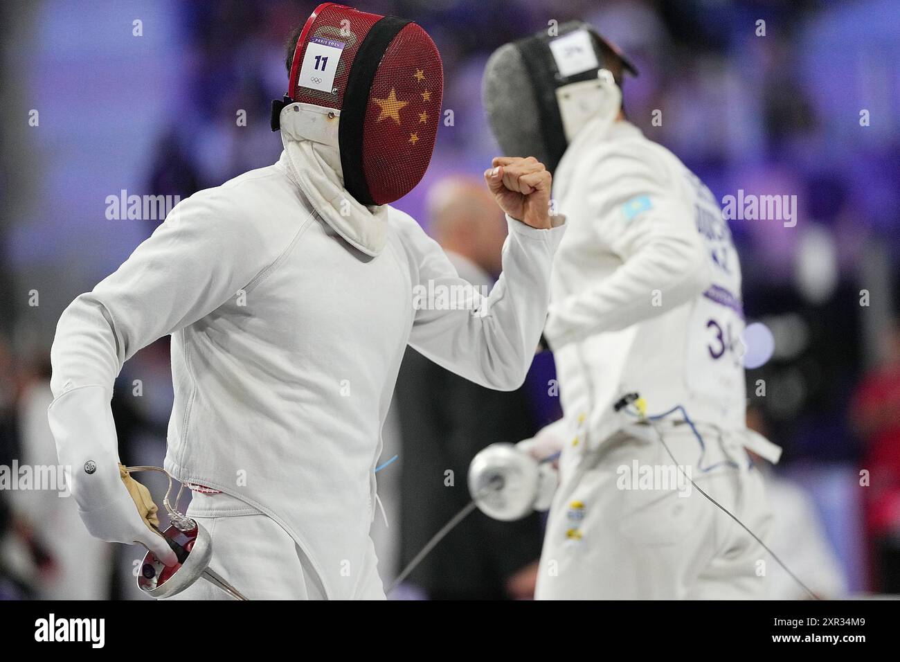 Paris, France. 8th Aug, 2024. Luo Shuai of China celebrates scoring ...