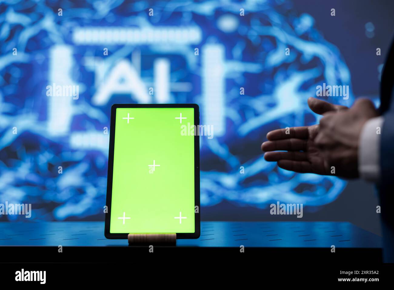 Engineer in startup doing advancements in AI field using mockup tablet ...