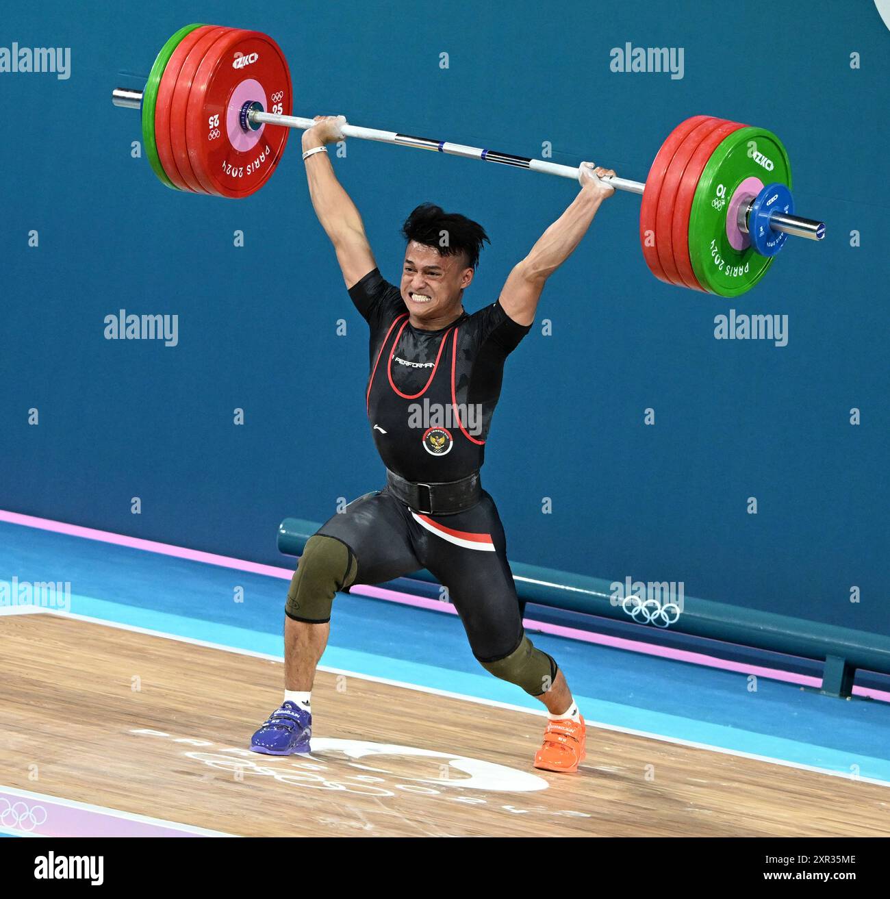 JUNIANSYAH Rizki of Indonesia competes during the men's weightlifting ...
