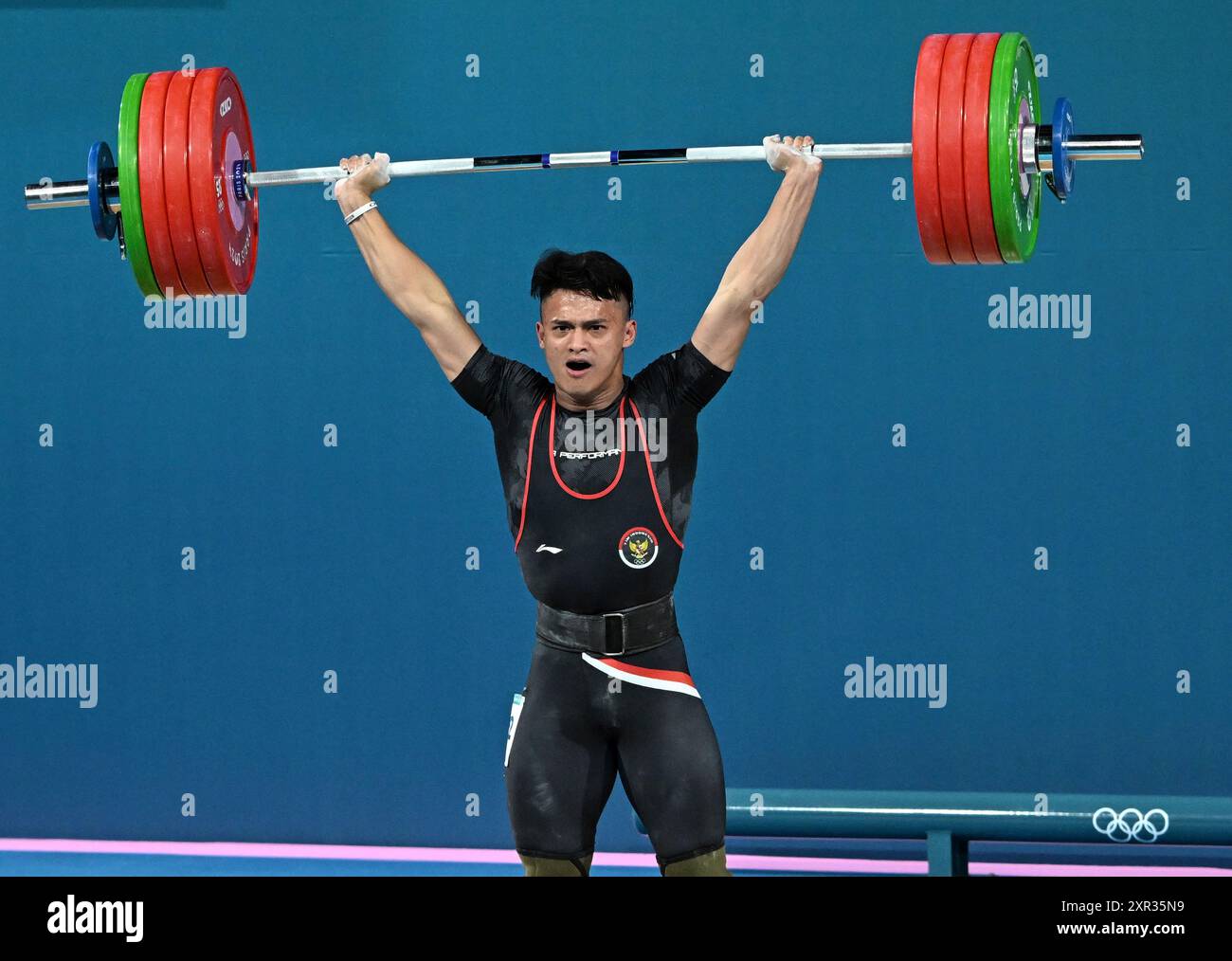 JUNIANSYAH Rizki of Indonesia competes during the men's weightlifting ...