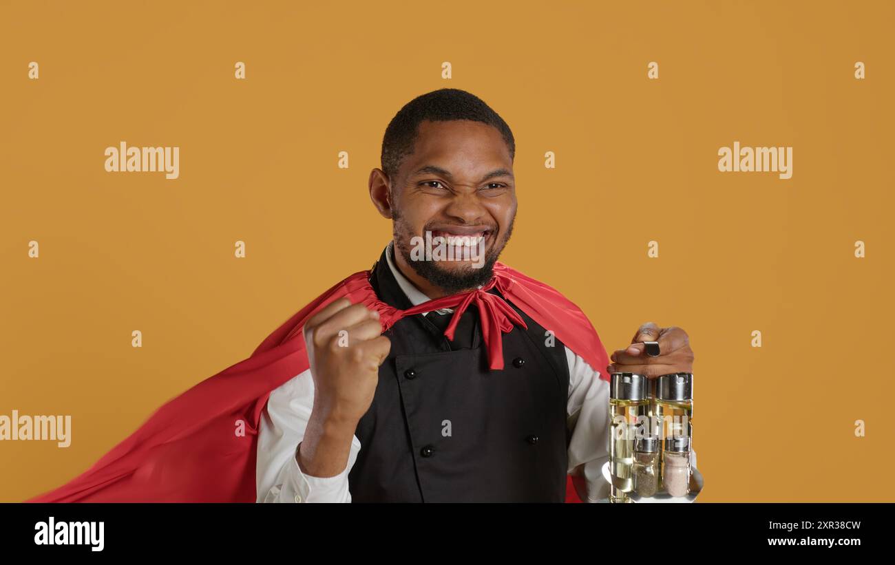 Waiter with a superhero cape acting as a savior against yellow ...