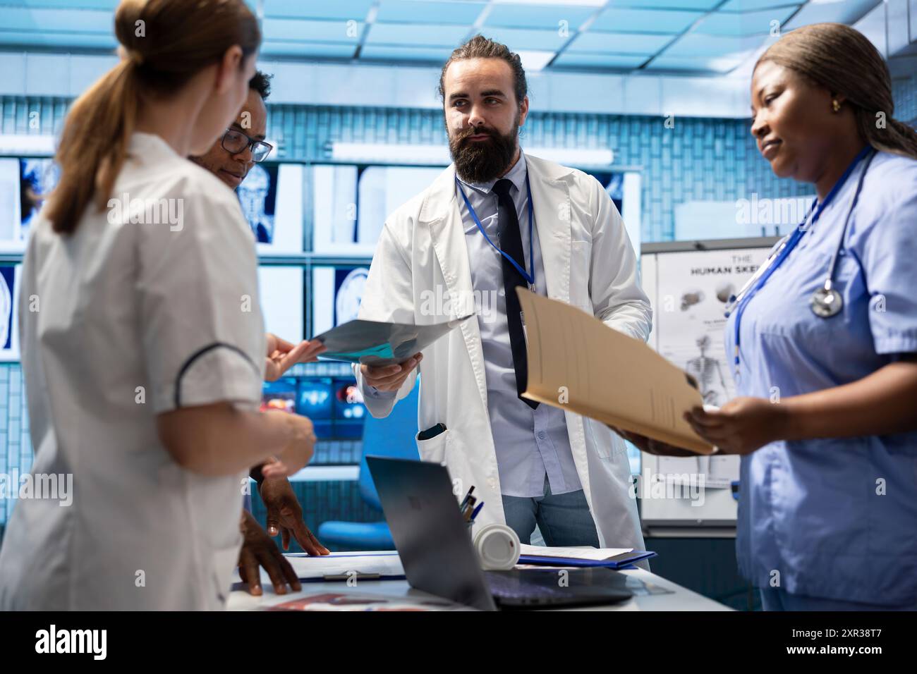 Healthcare experts team reviews x ray results to find best treatment ...