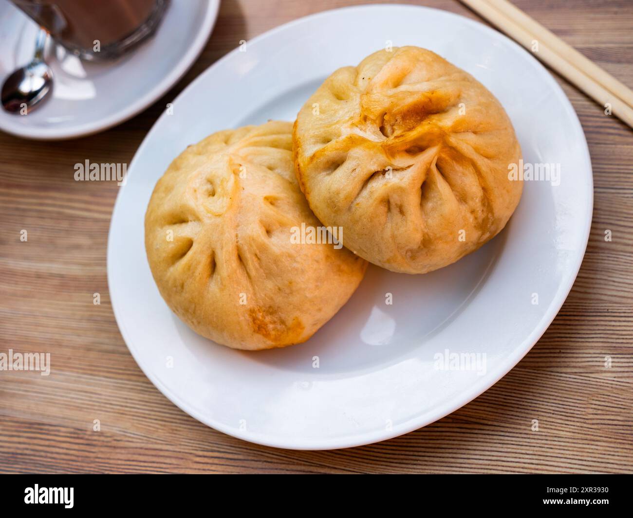 Steamed soft buns - traditional Chinese dish pan chino Stock Photo - Alamy