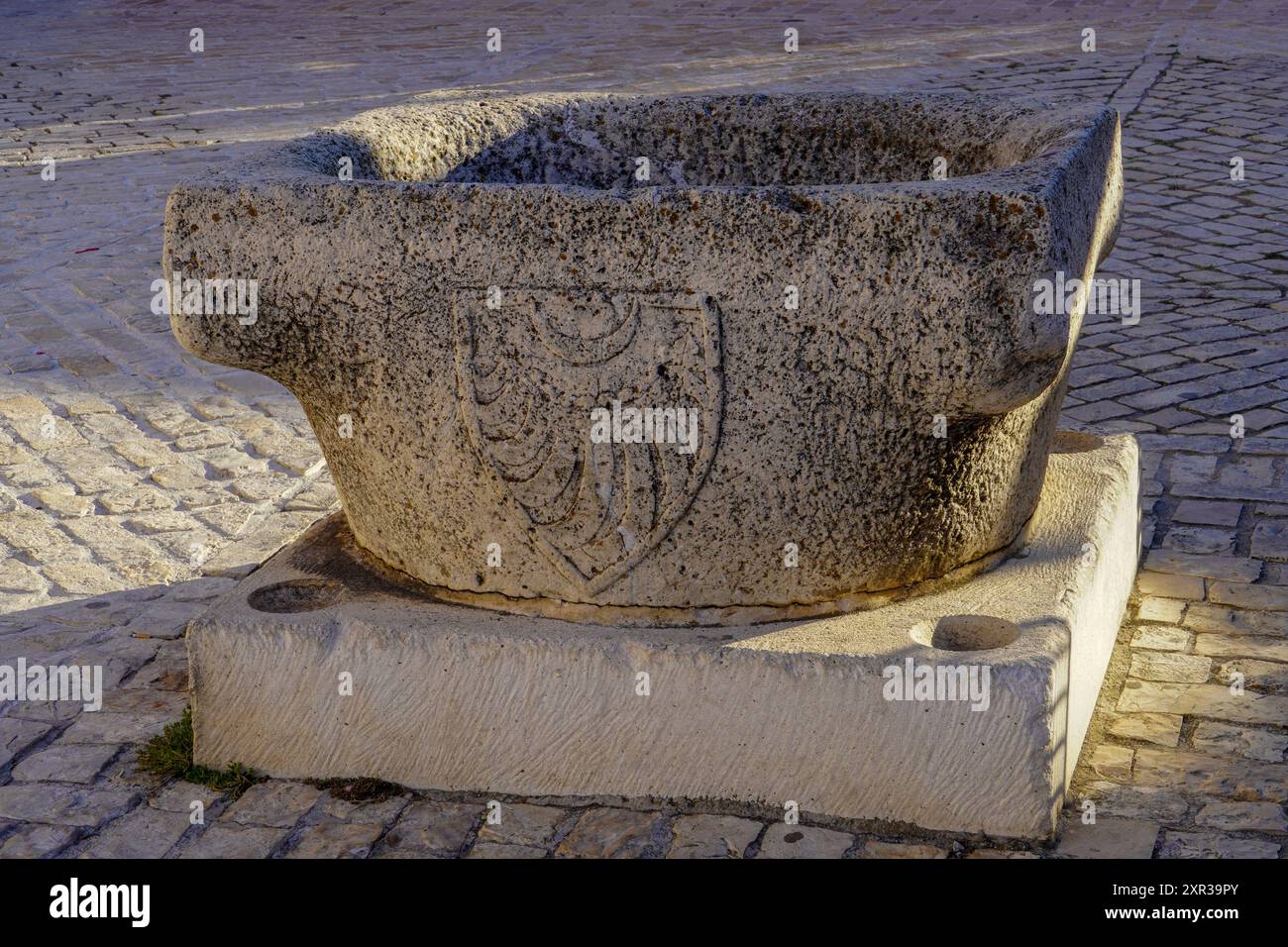 Antique processed stone for a well Stock Photo - Alamy