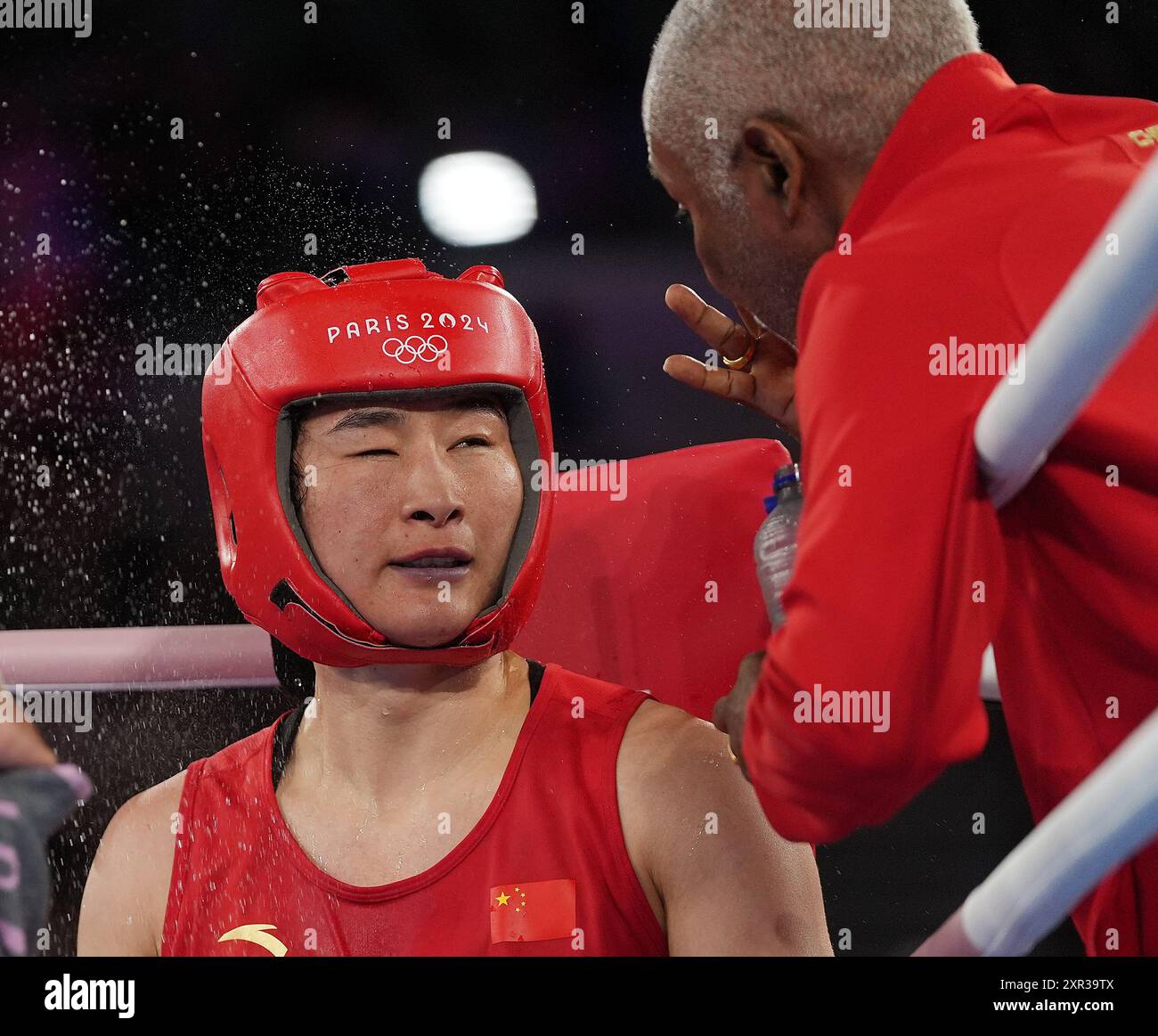 Paris, France. 8th Aug, 2024. Li Qian (L) of China talks with her coach ...