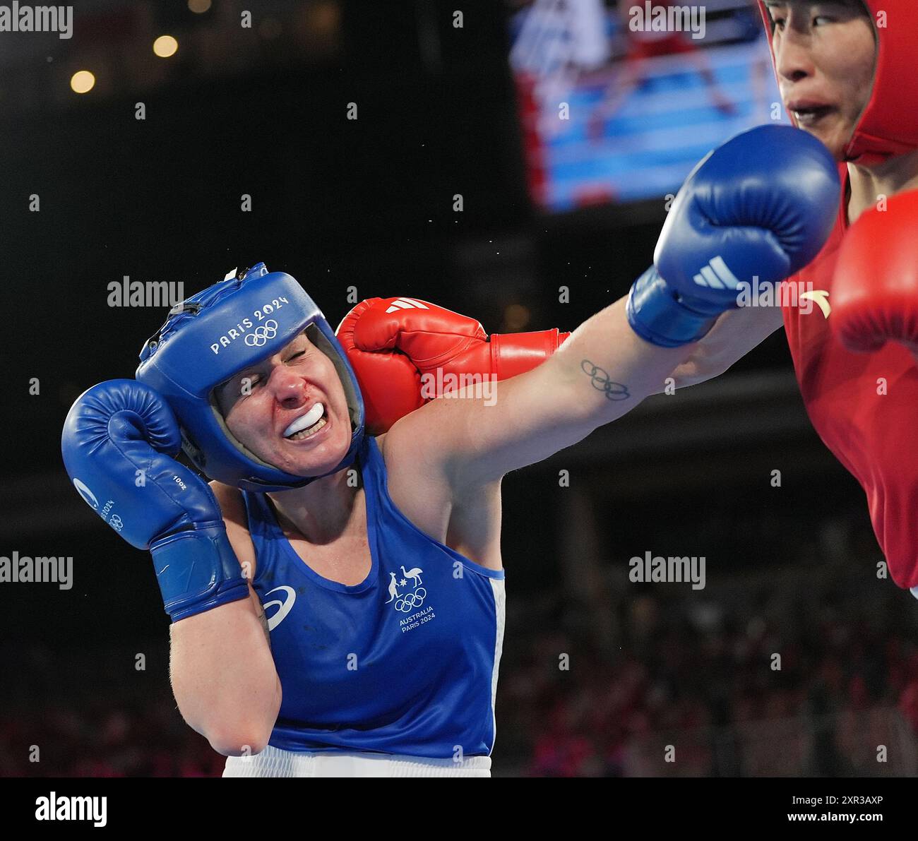 Paris, France. 8th Aug, 2024. Li Qian (in red) of China competes ...