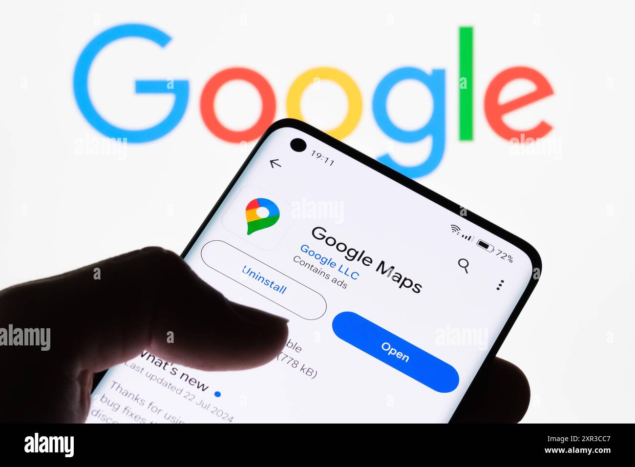 Close-up of a smartphone screen displaying Google Maps app with Google ...
