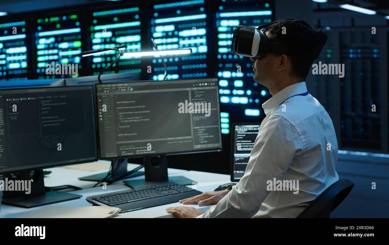 Data center admin responsible for installation of networking systems wearing high tech VR ...