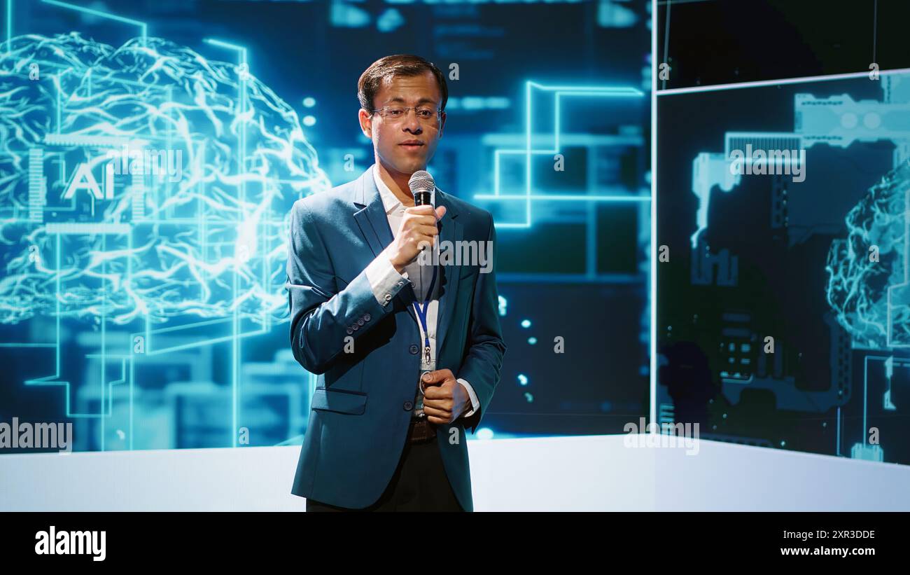 Presenter talking with spectators at AI convention bringing together IT ...