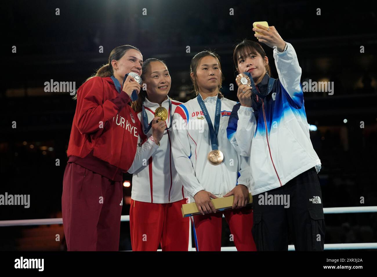 Silver medalist, from left, Turkey's Hatice Akbas, gold medalist China ...