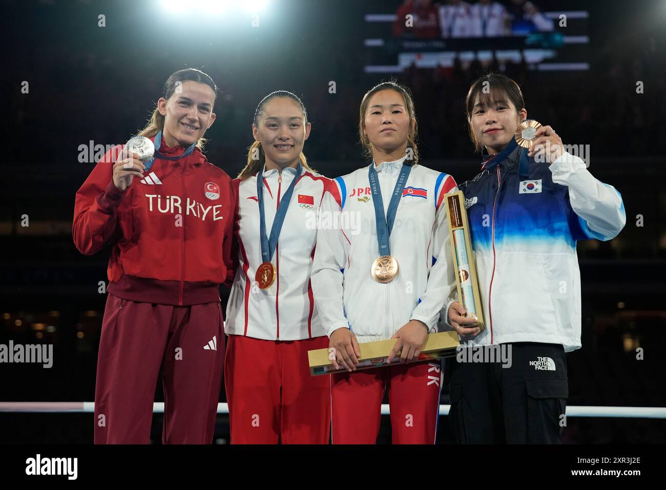 Silver medalist, from left, Turkey's Hatice Akbas, gold medalist China ...