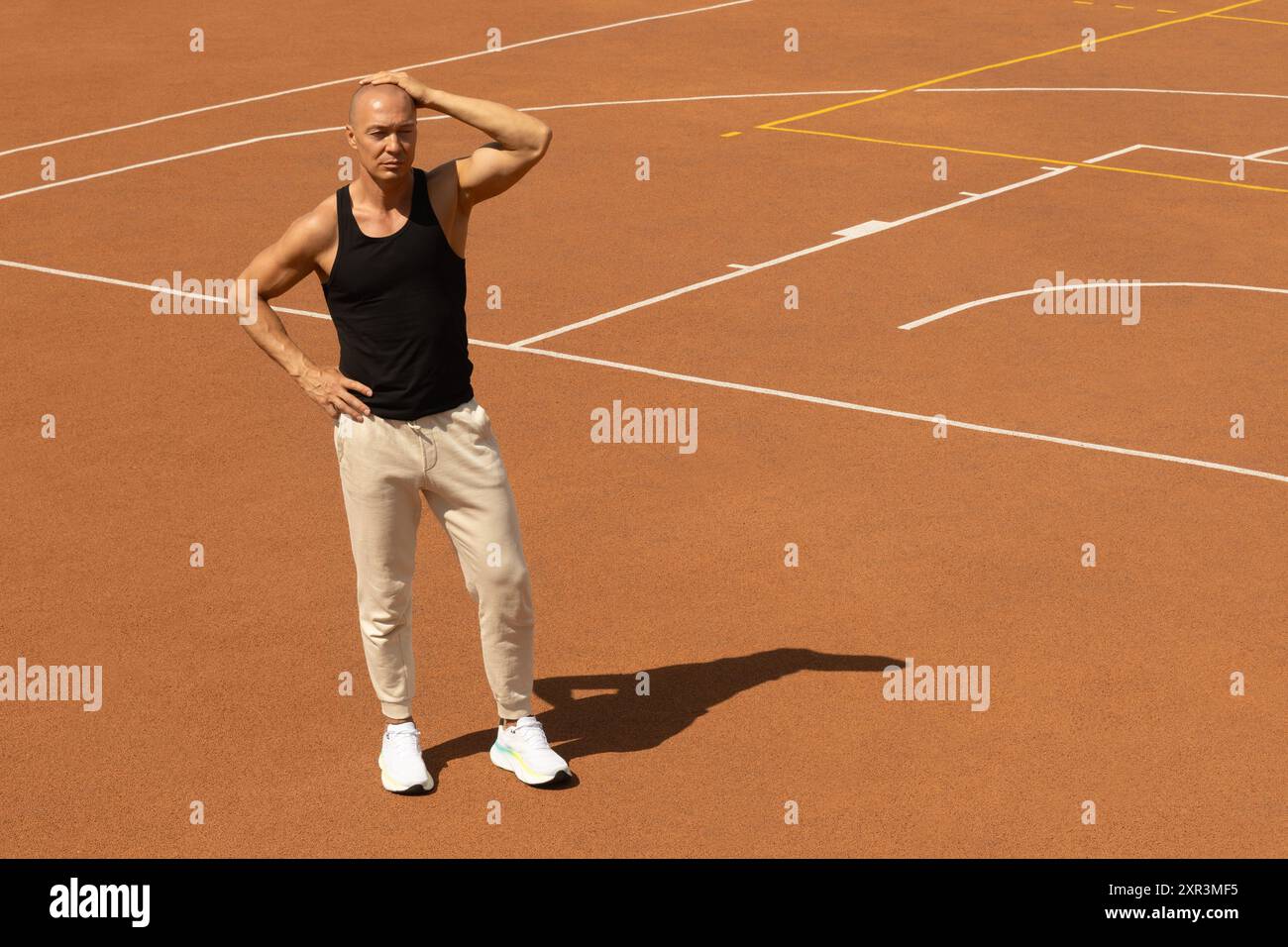 Athlete man or sports trainer thinking and checking game on sport field ...