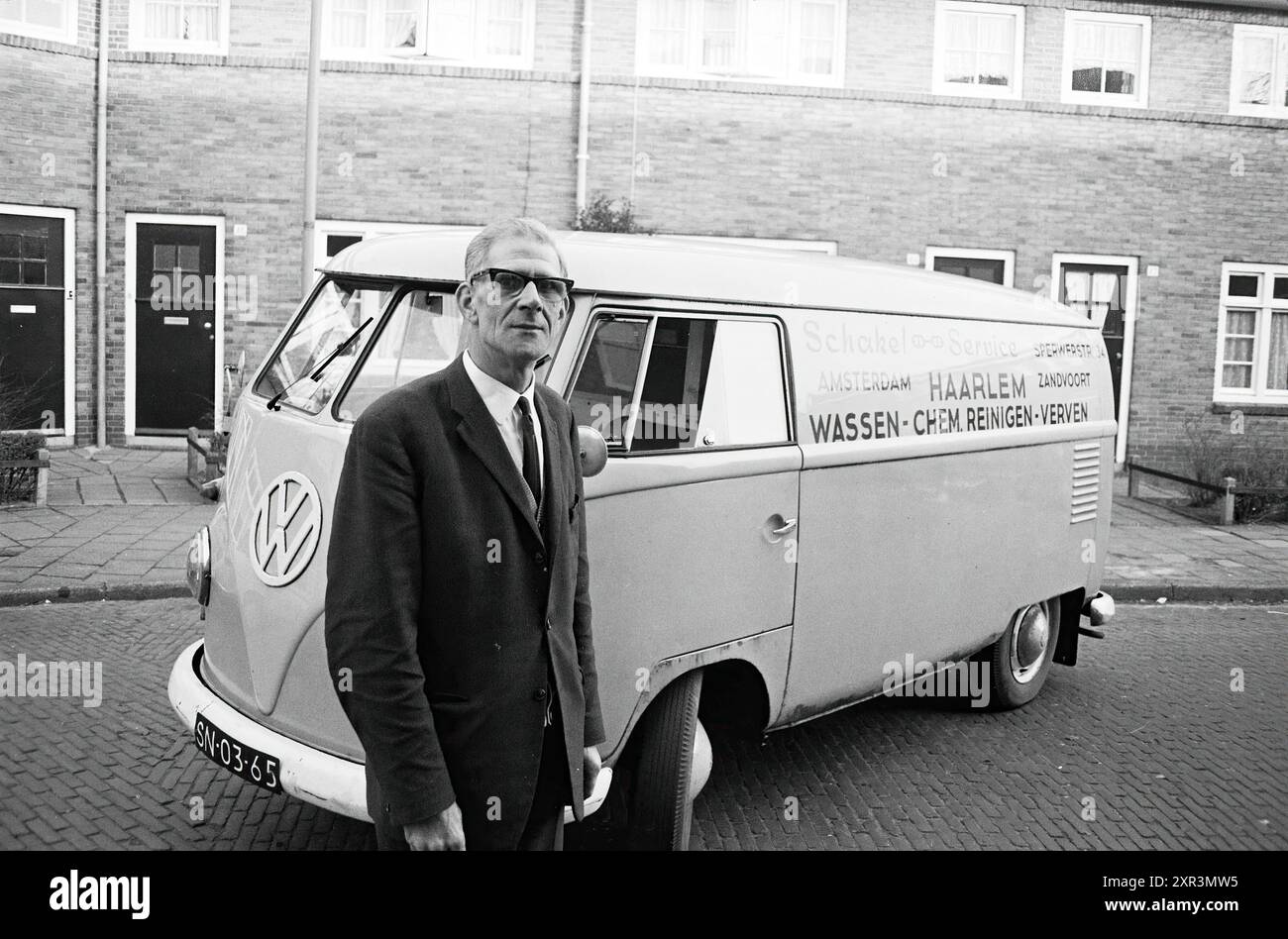 Man in front of his VW van 'Switch Service, Washing - Chem. cleaning - Painting', Haarlem ...