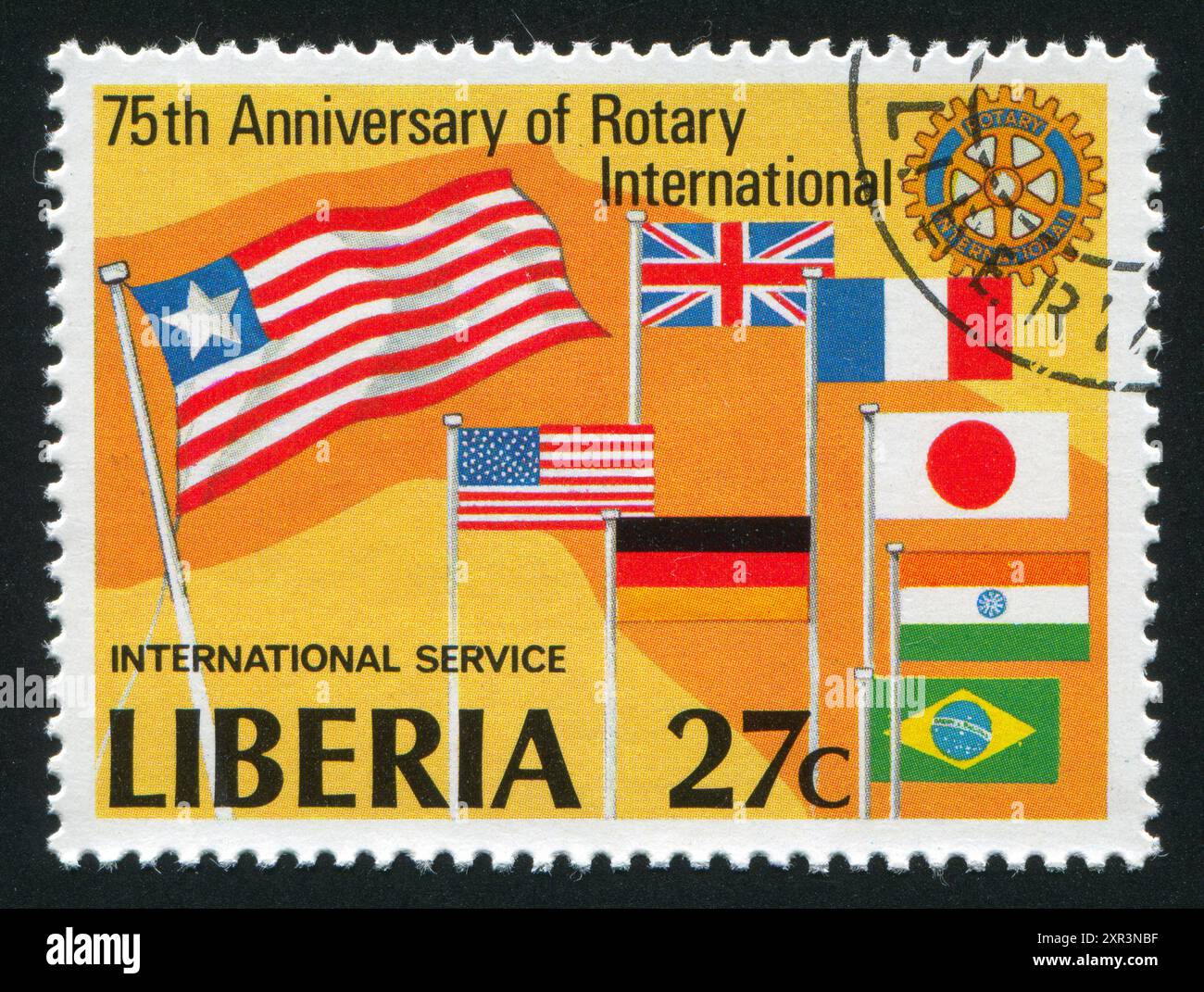 LIBERIA - CIRCA 1979: stamp printed by Liberia, shows Rotary emblem and flags, circa 1979 Stock ...