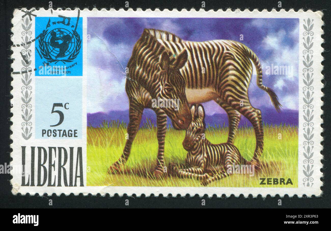 LIBERIA - CIRCA 1971: stamp printed by Liberia, shows UNICEF emblem and ...