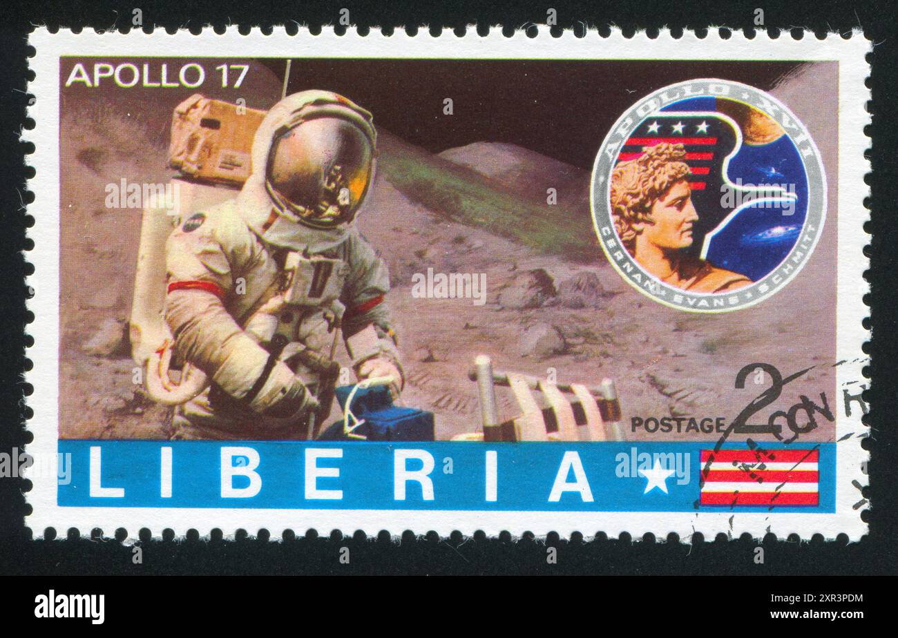 LIBERIA - CIRCA 1973: stamp printed by Liberia, shows Apollo badge and astronaut on moon, circa ...