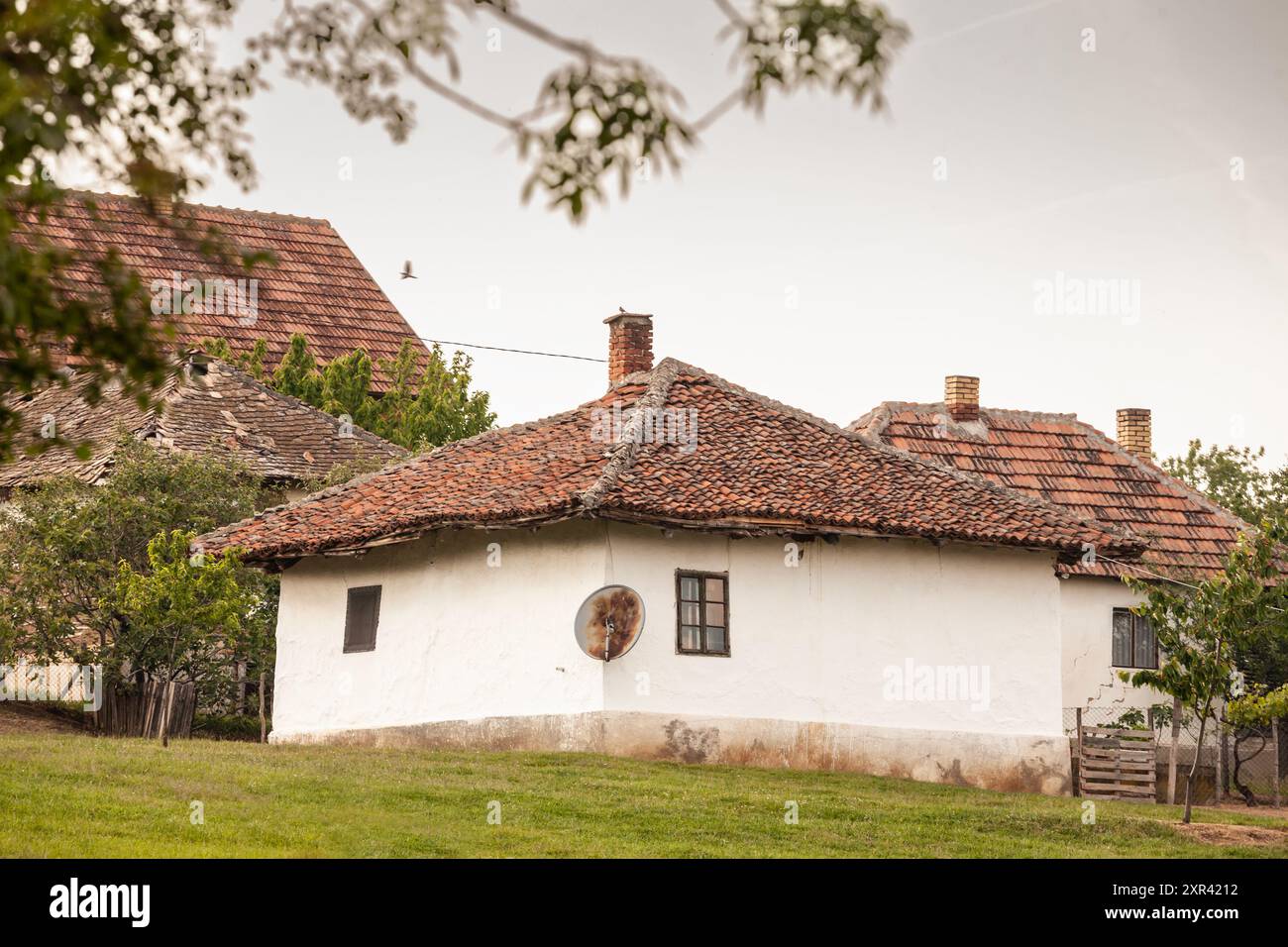 This photograph captures the striking contrast between a traditional ...