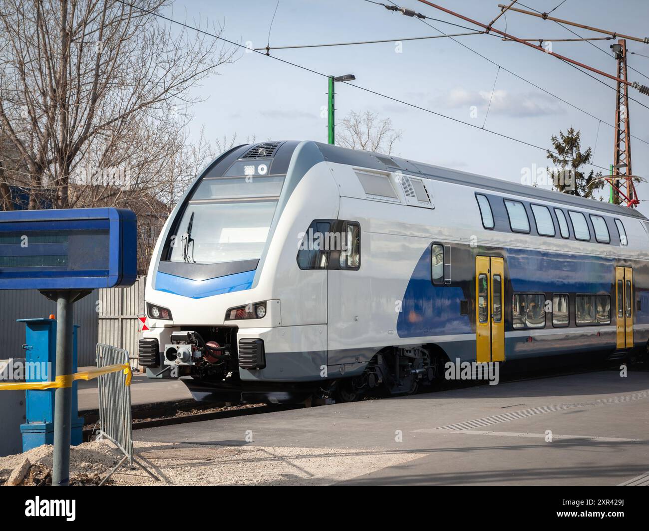 This image captures a modern European EMU (Electric Multiple Unit) train designed for regional ...