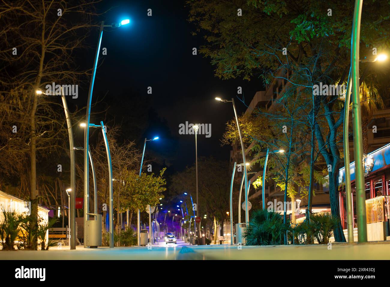 illuminated pedestrian street with modern streetlight and led lanterns ...