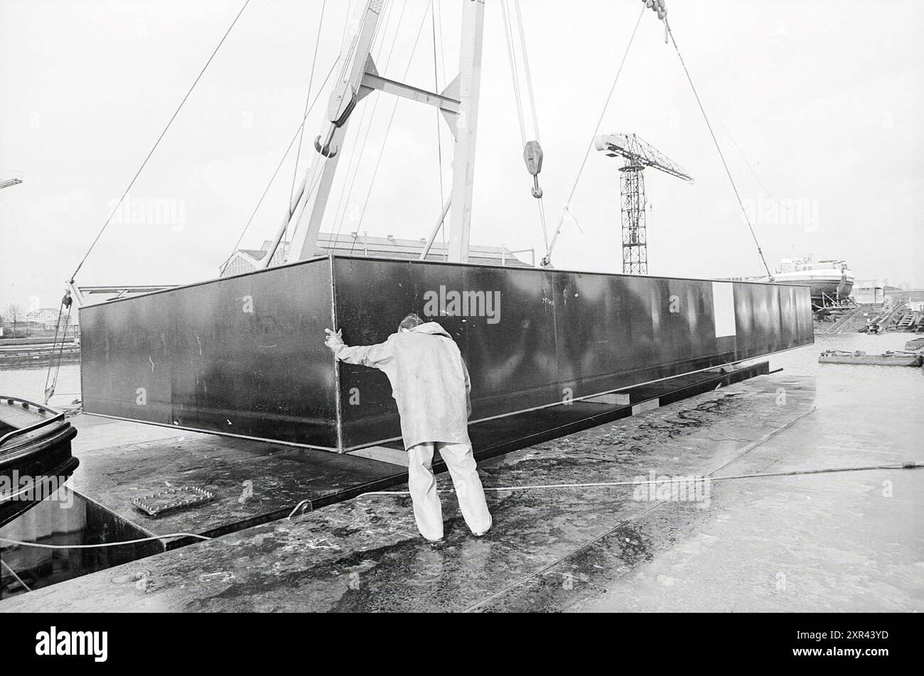 Placement of vessel on a deck barge in a port, 00-00-1972, Whizgle ...
