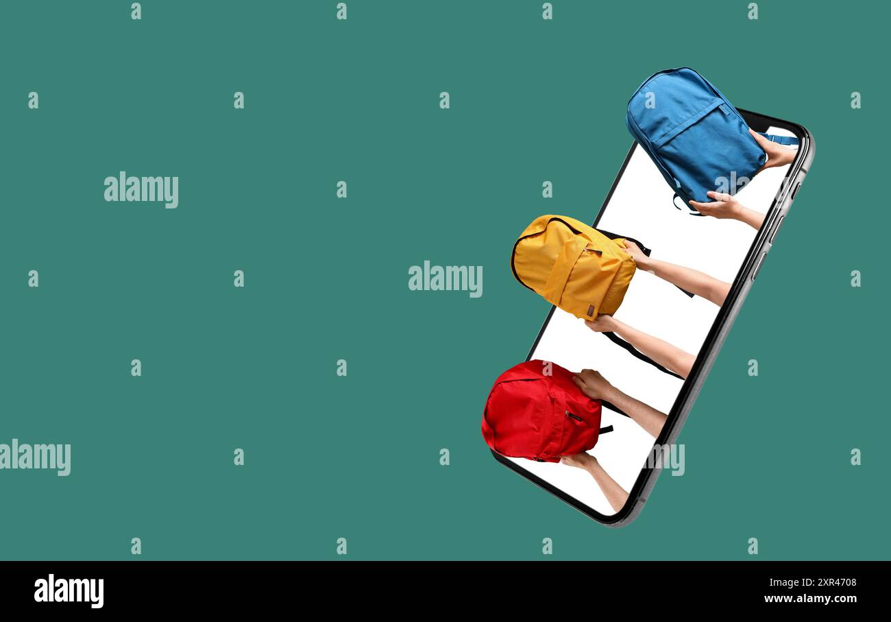 Big mobile phone with hands holding school backpacks on green ...