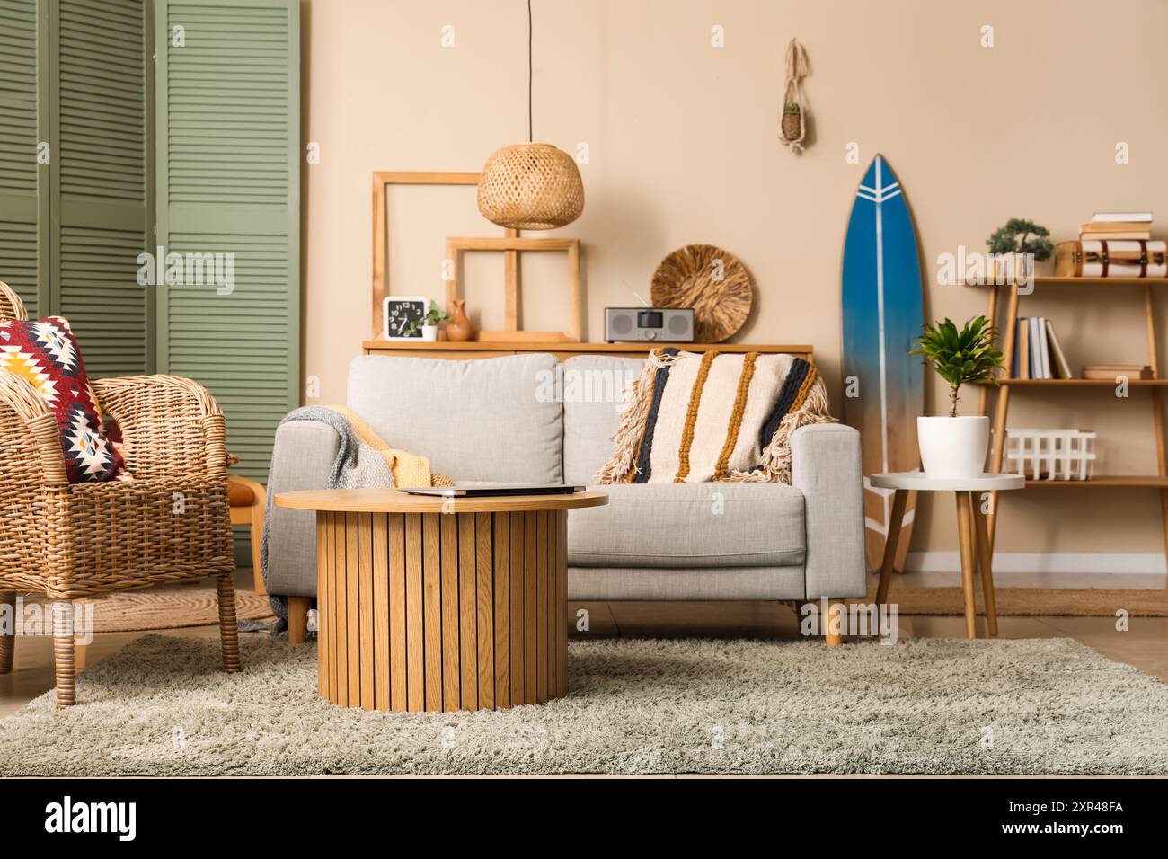 Interior of light living room with cozy sofa and coffee table Stock ...