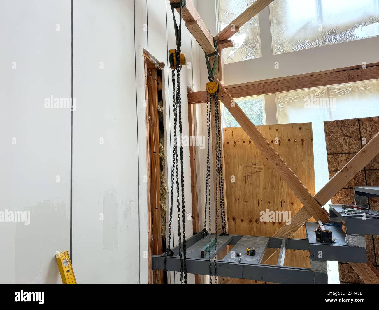 New building is undergoing installation of metal support stairs to ...