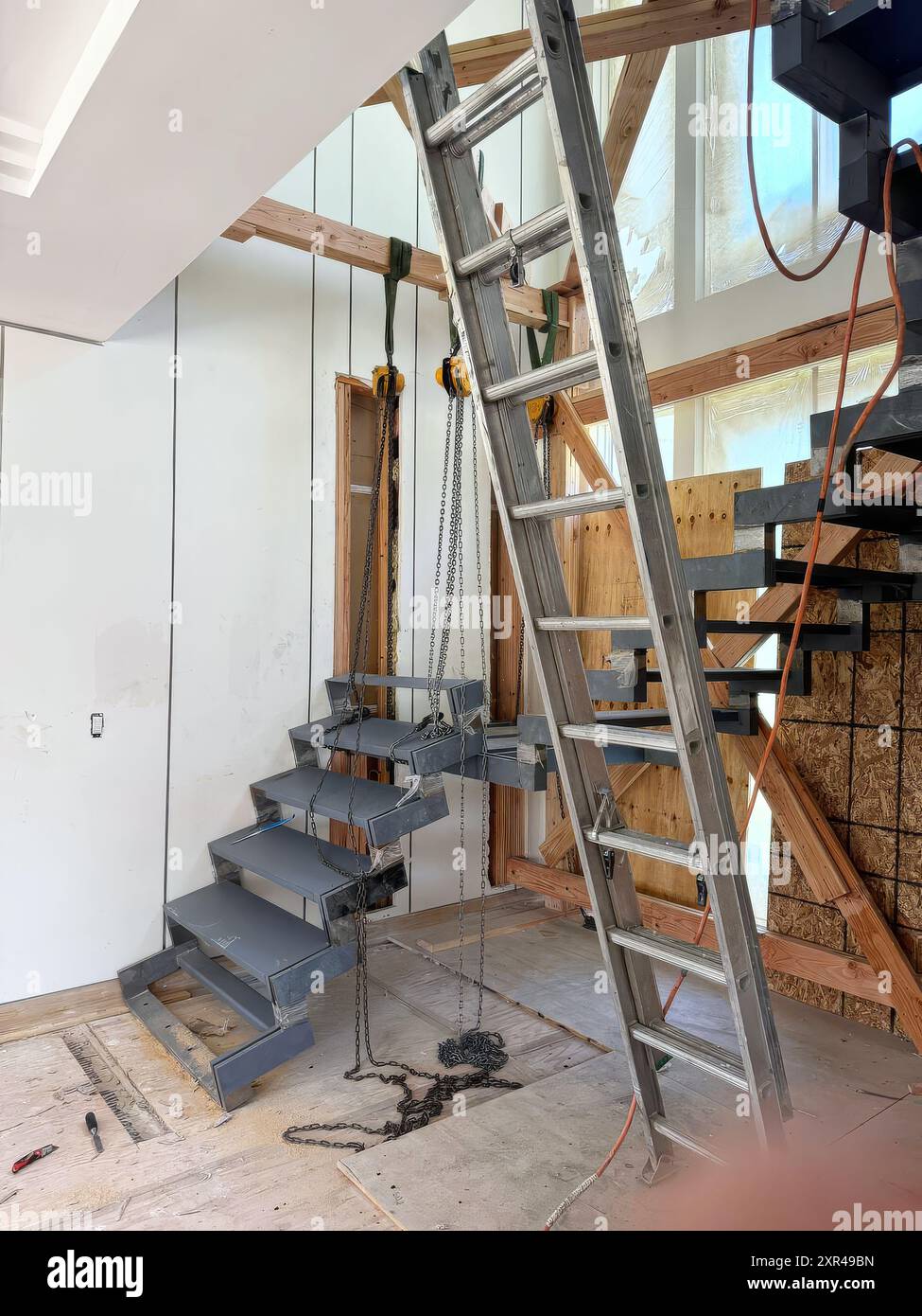 Building new home building requires installation of metal support ...
