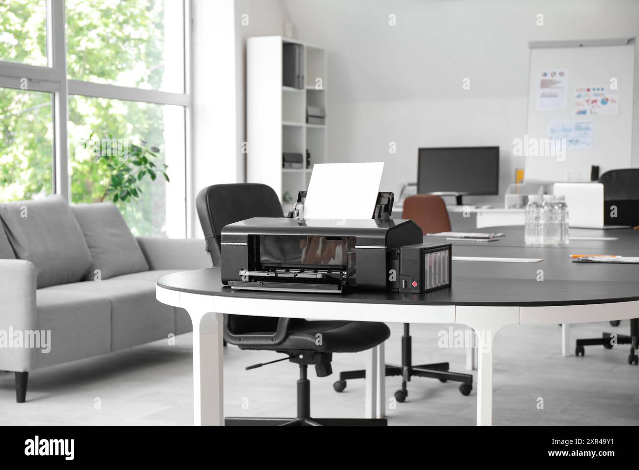 Modern printer printing documents hi-res stock photography and images ...