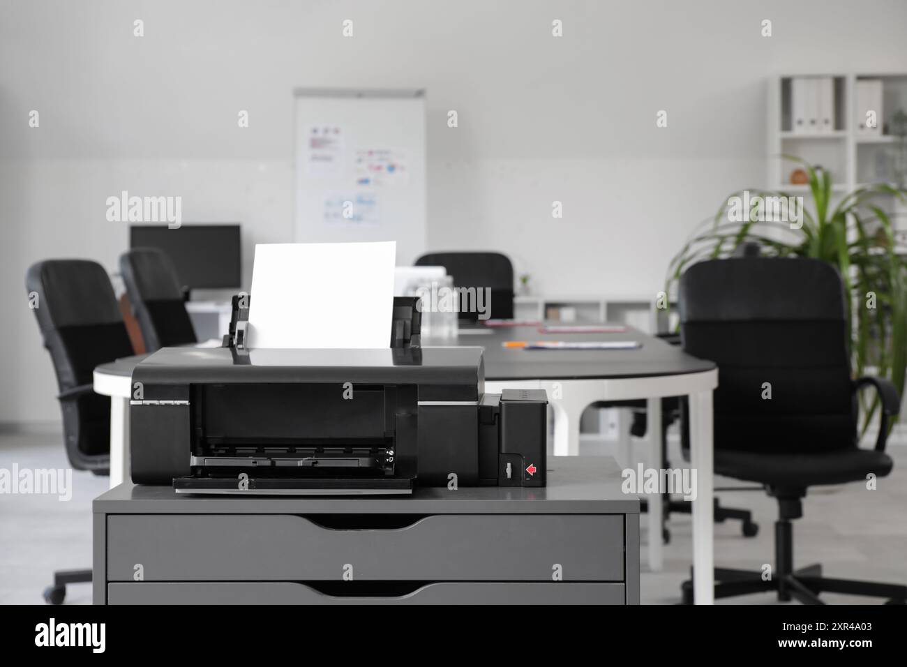 Modern printer printing documents hi-res stock photography and images ...