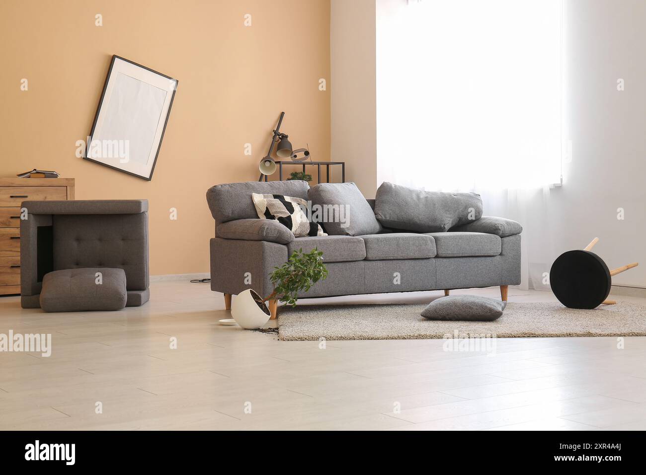 Interior of damaged living room after earthquake Stock Photo - Alamy