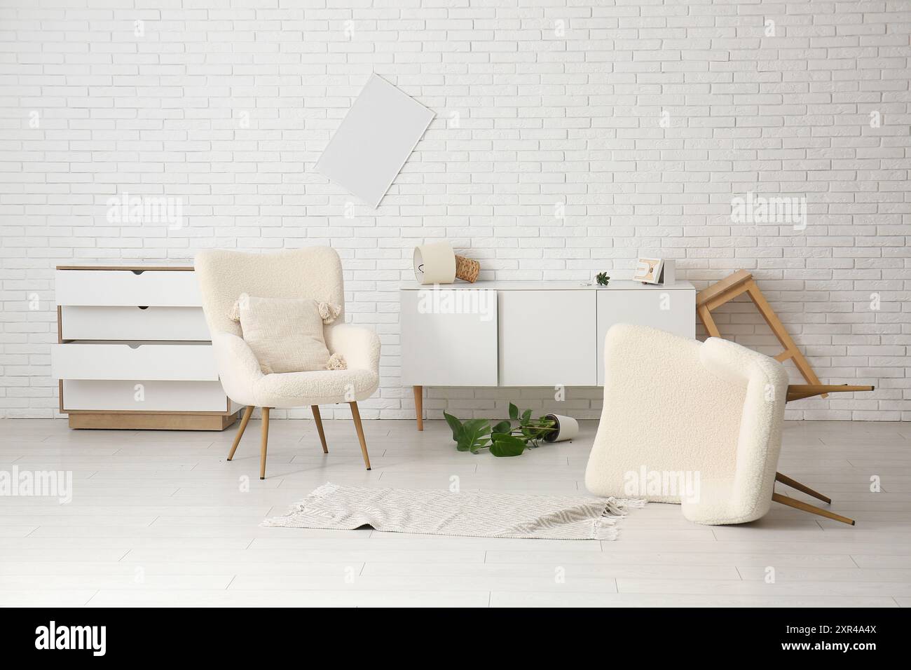 Interior of damaged living room with armchairs after earthquake Stock ...