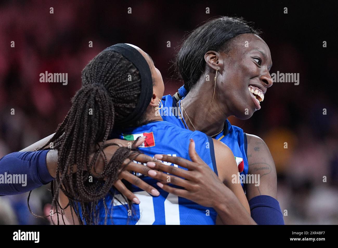Paris, France. 8th Aug, 2024. Paola Ogechi Egonu (R) of Italy hugs with teammate Oghosasere ...
