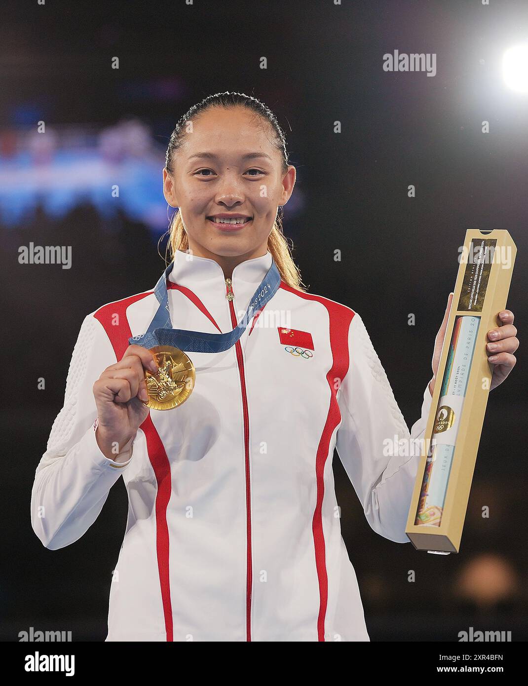 Paris, France. 8th Aug, 2024. Gold medalist Chang Yuan of China shows ...