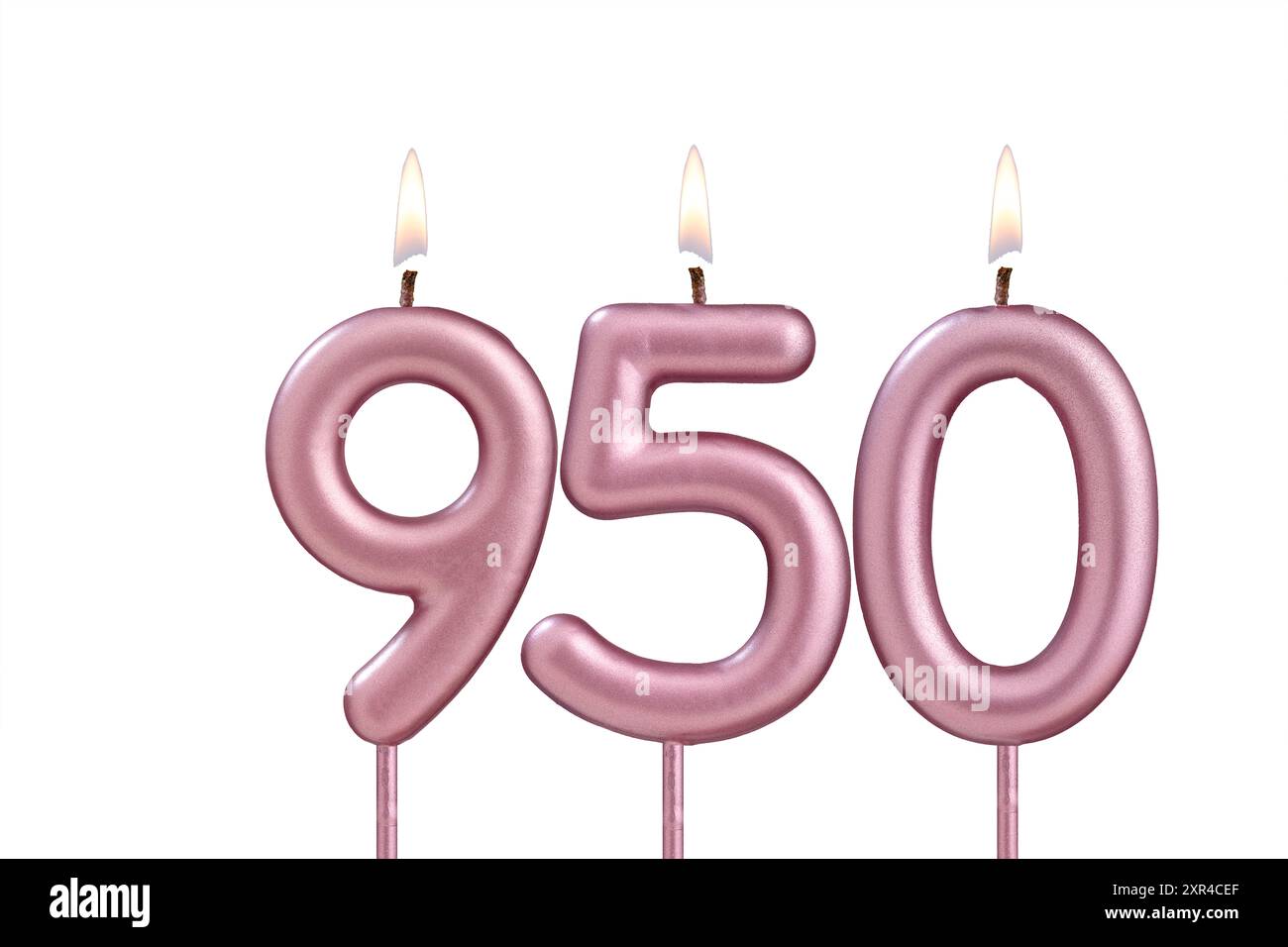 Lit birthday candle - Candle number 950 on white background Stock Photo ...